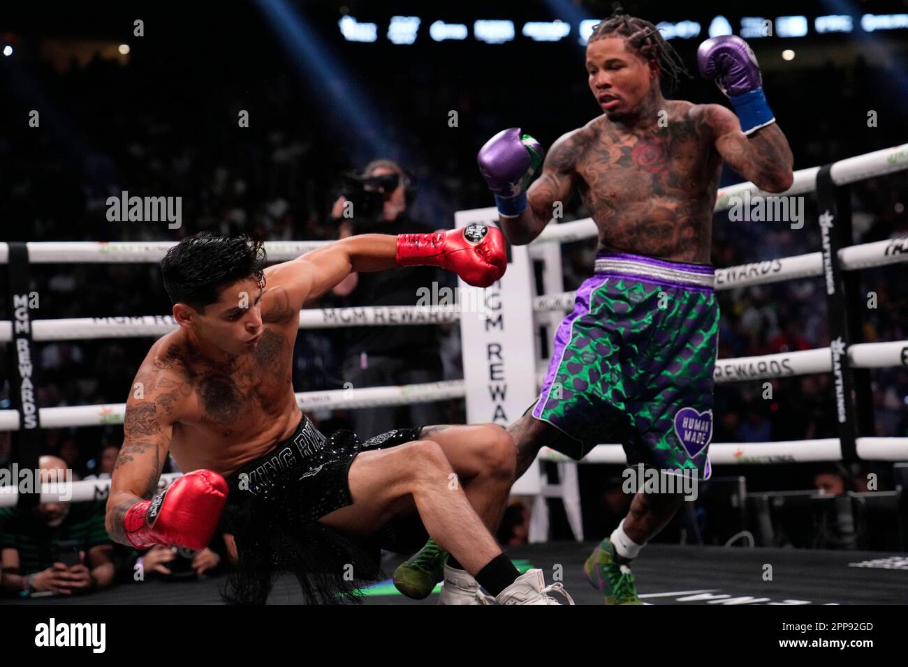 Gervonta Davis knocks down Ryan Garcia in a lightweight boxing bout ...