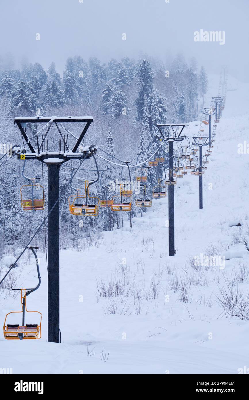 Teletsky Altai winter mountain ski resort near Iogach. Elevator on ...
