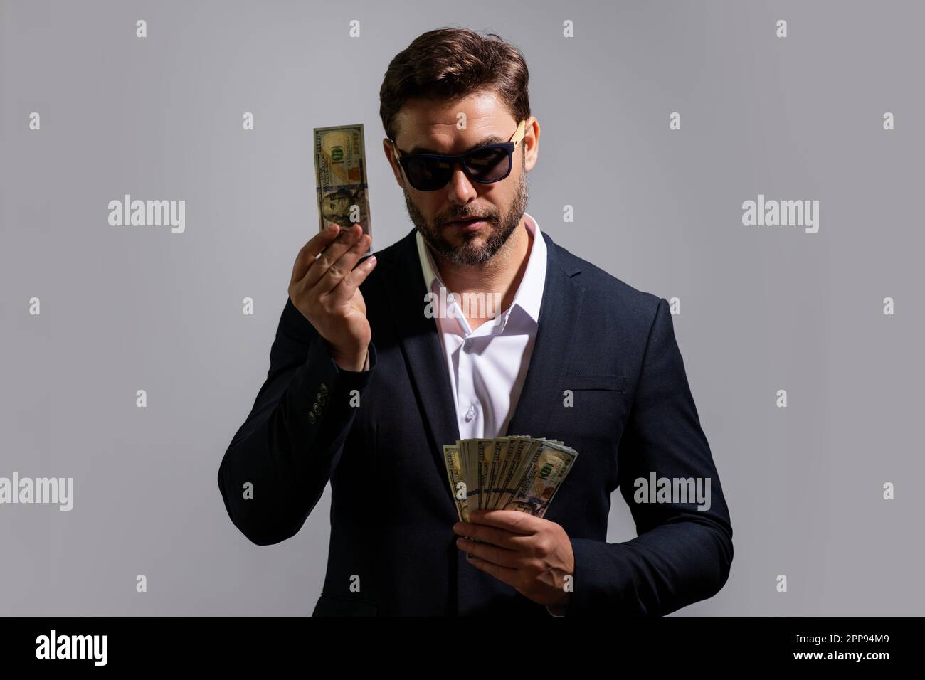 Business man with money banknotes. Male entrepreneur with dollar bills ...