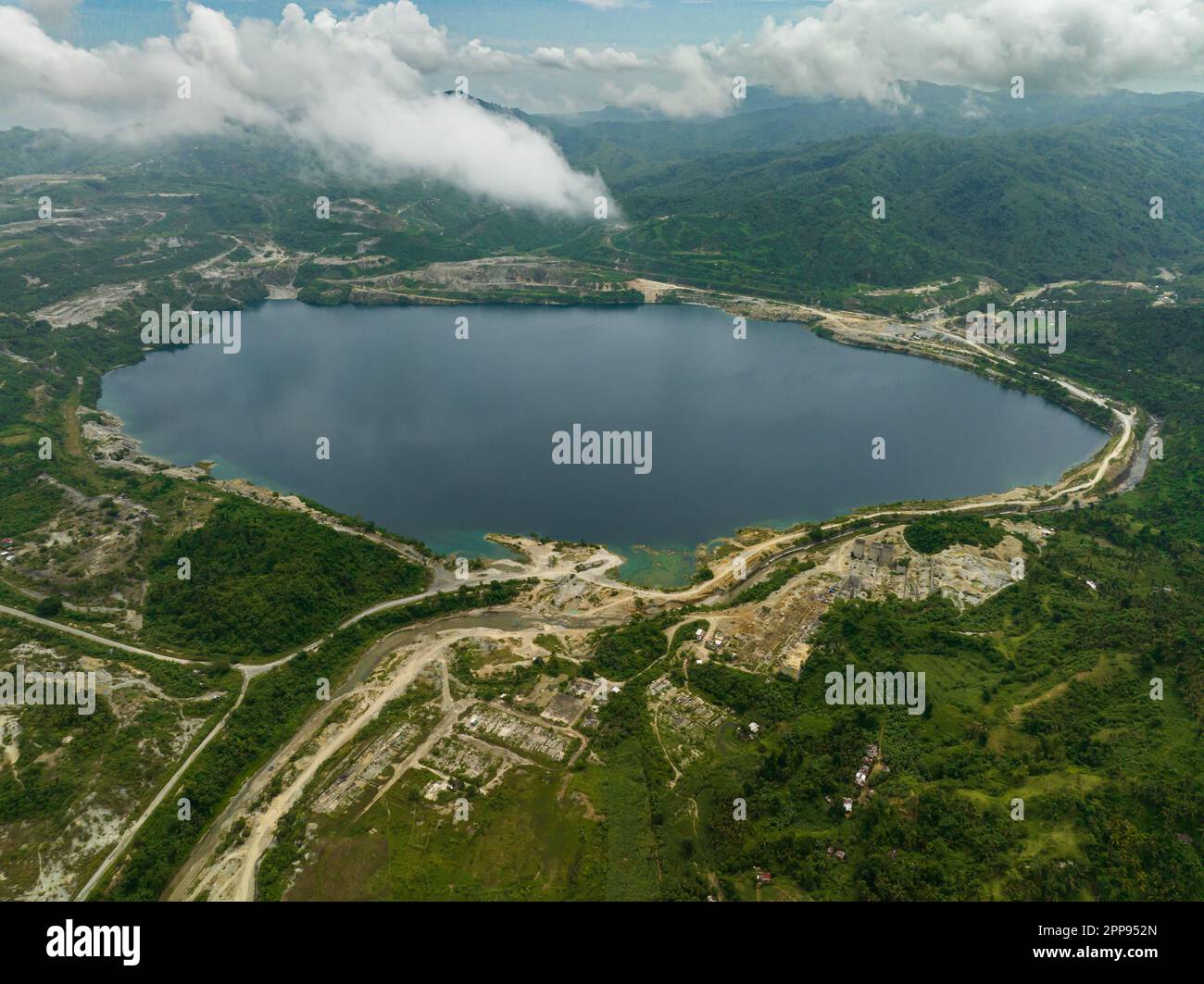 A lake in a flooded mining quarry. Sipalay, Negros, Philippines Stock ...