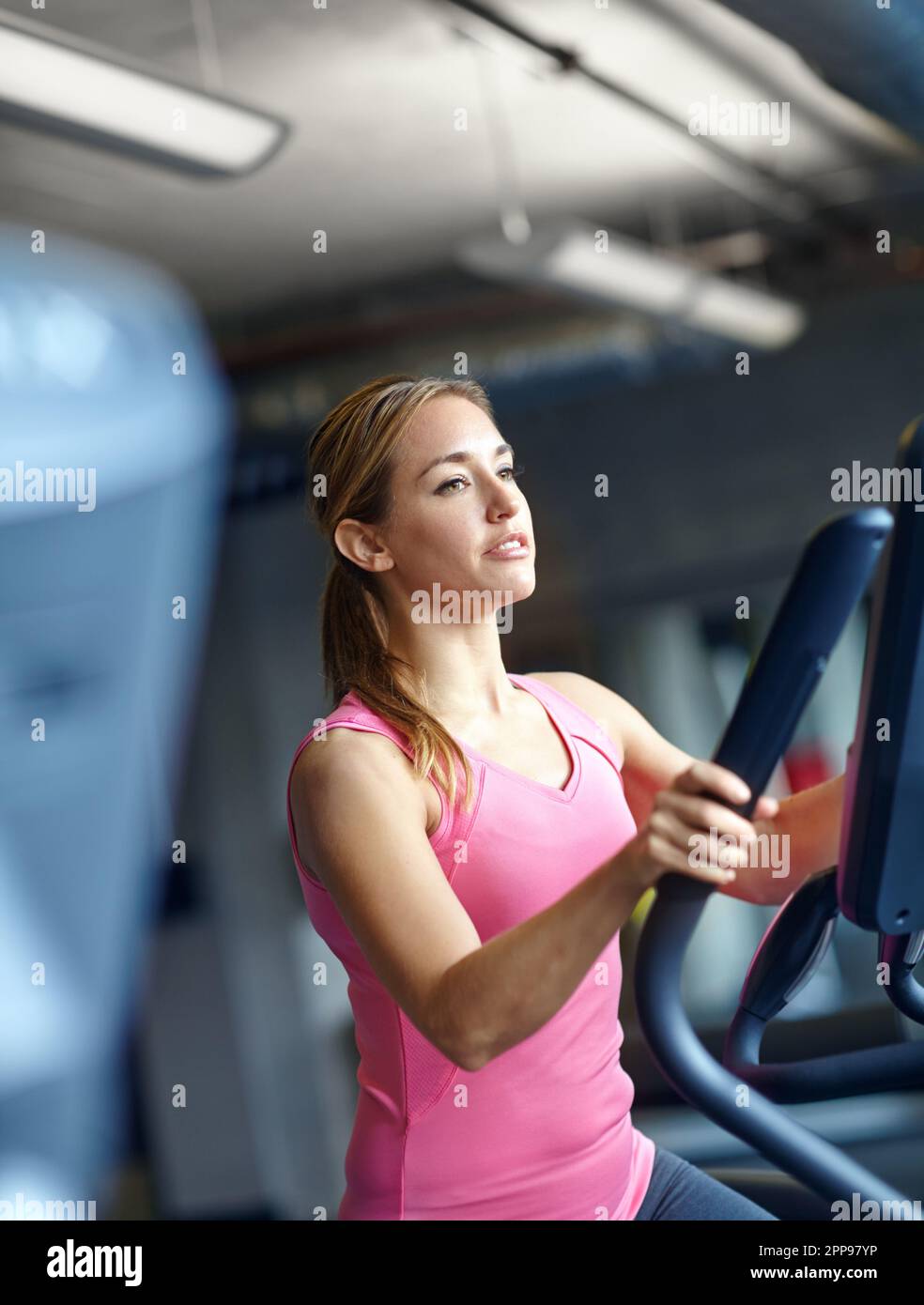 Im making great progress. A beautiful young woman working out at the ...