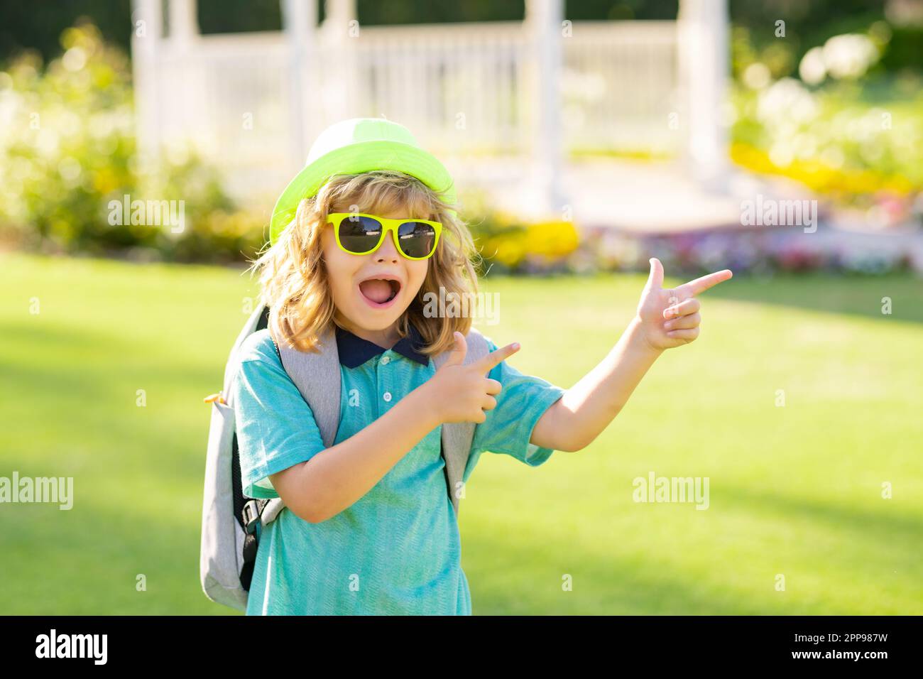 Excited kids in hat and summer sunglasses. Lifestyle portrait of cute ...