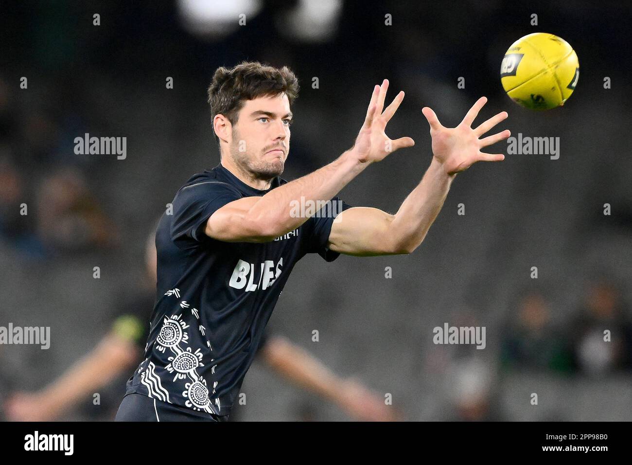 George Hewett of the Blues warms up ahead of the AFL Round 6 match ...