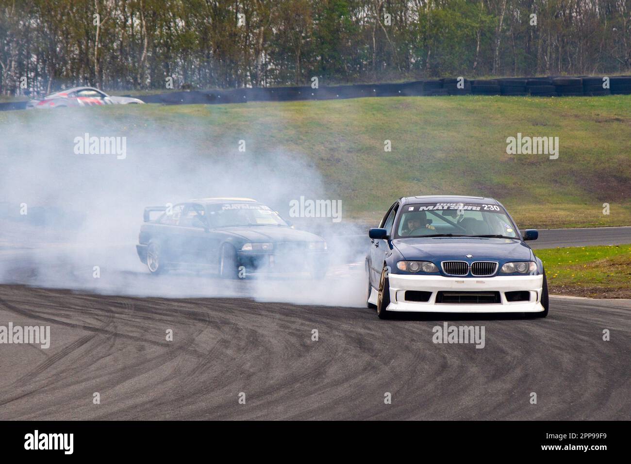 burning rubber and tires screeching at Three 3 Sisters Race Circuit in ...