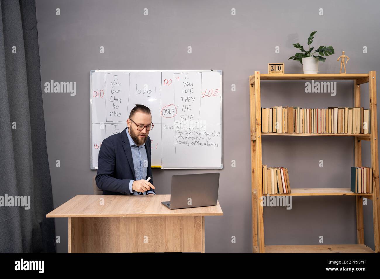 Modern education remotely. Tutor or teacher man with blackboard ...