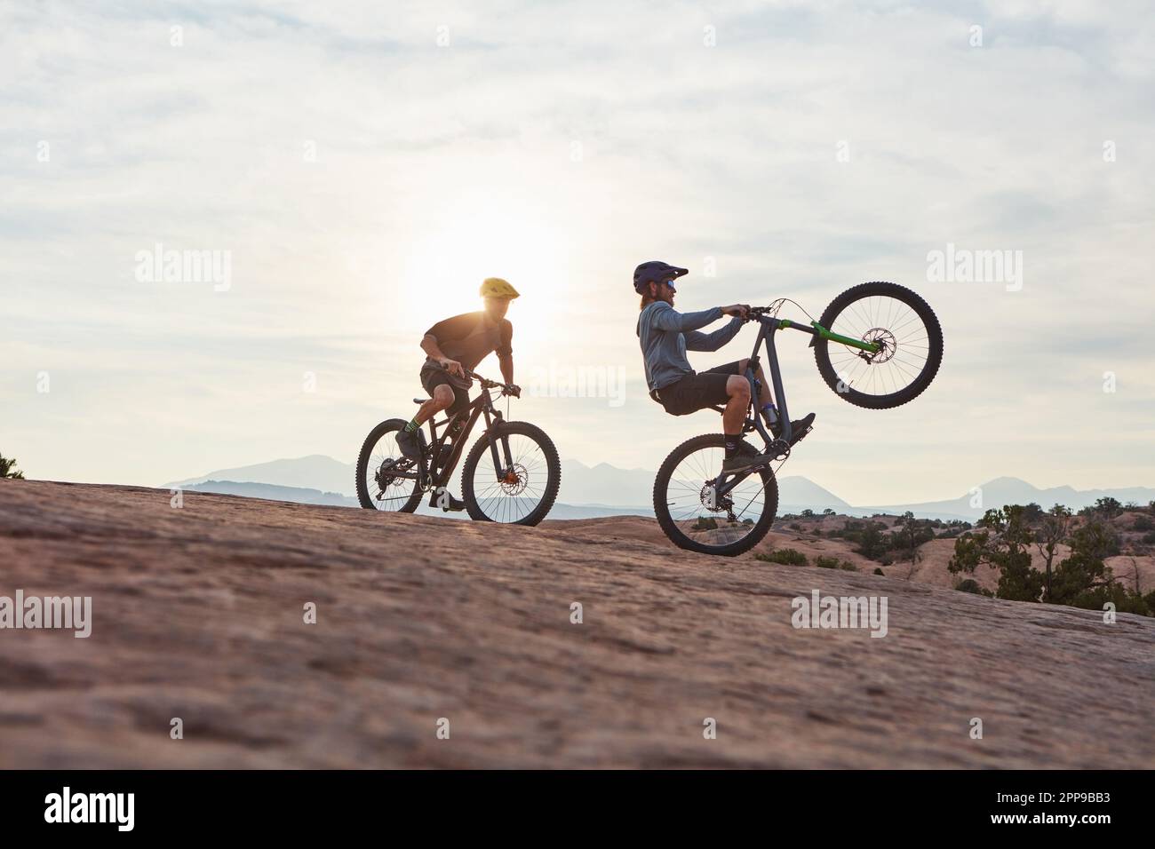 Its not easy but its definitely fun. Full length shot of two men out ...