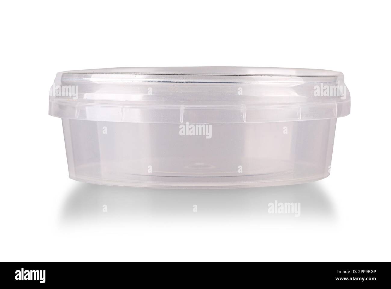 Empty closed plastic transparent food jar isolated on white with ...