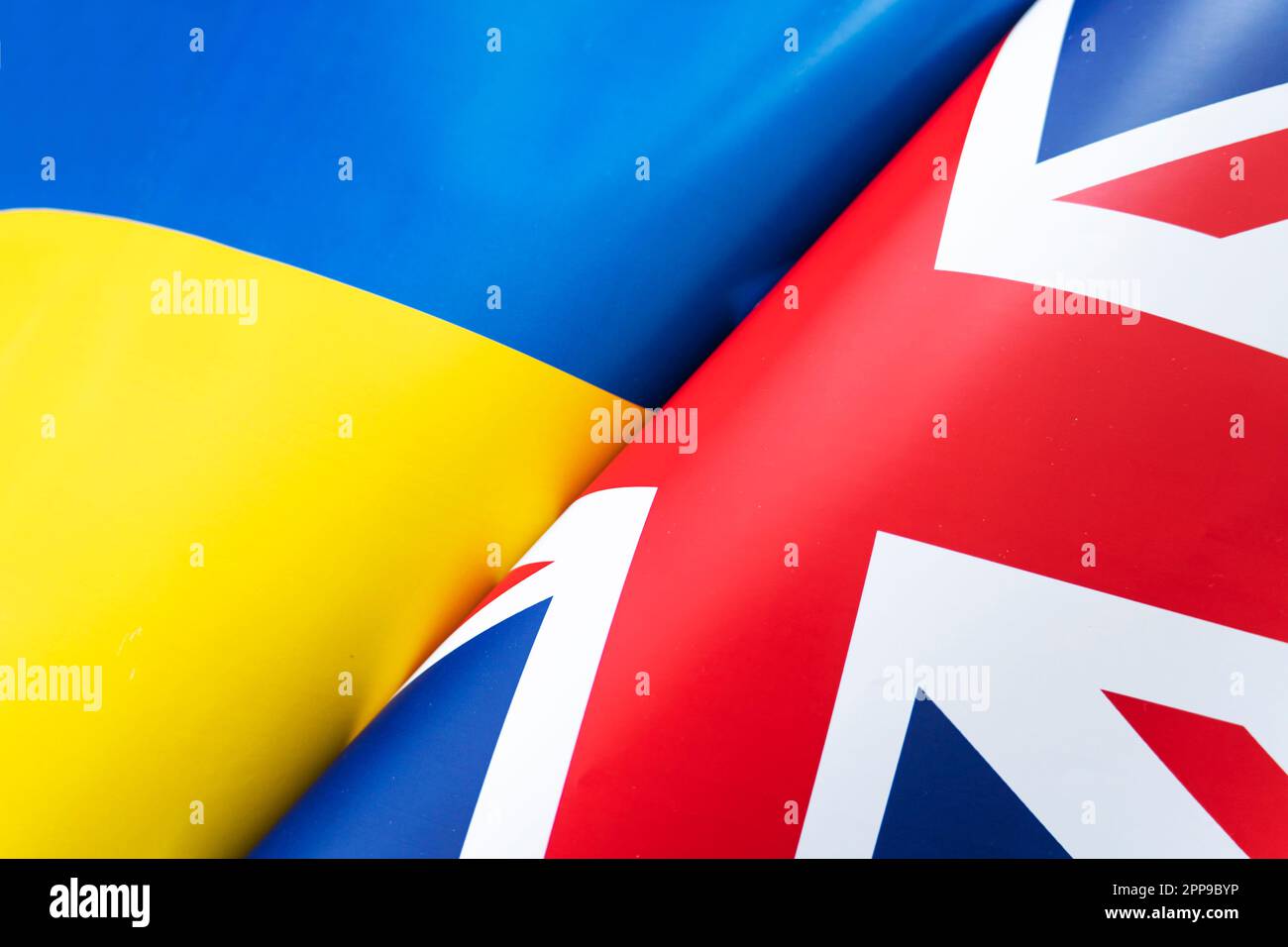 Background of the flags of the Ukraine and Great Britain. The concept ...