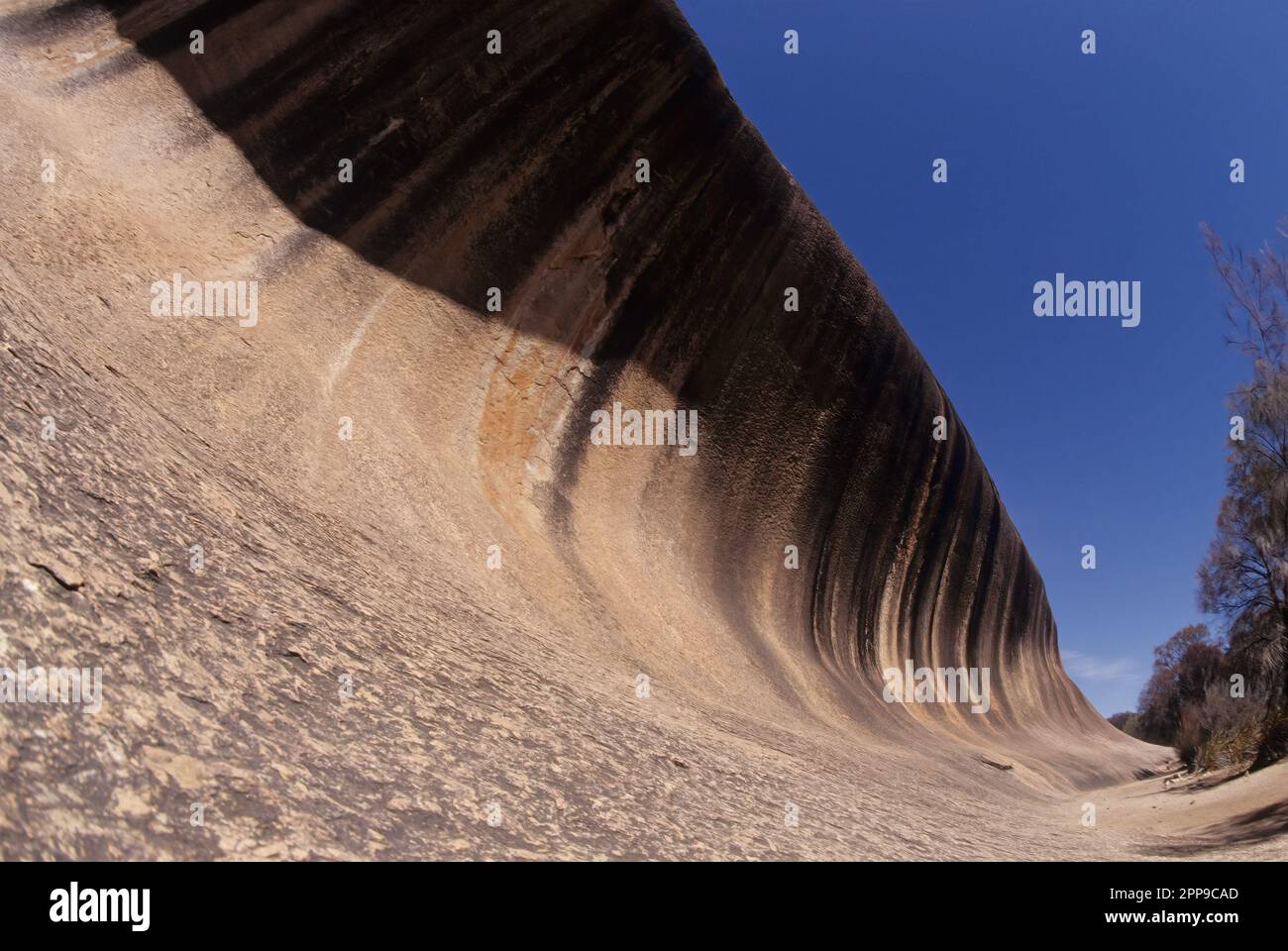 Wave Rock is a natural rock formation that is shaped like a tall ...