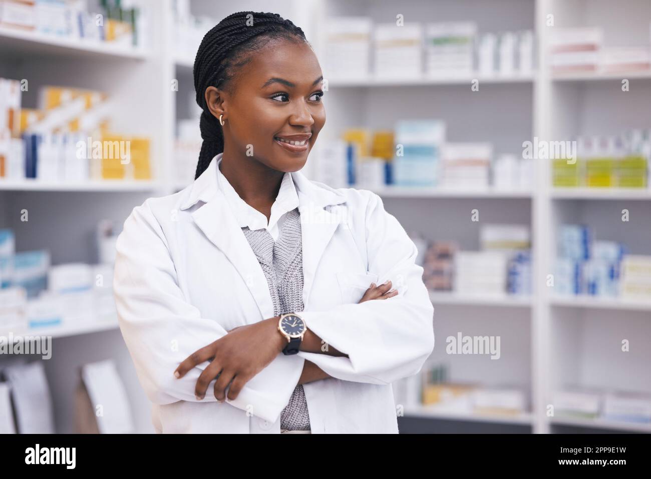 Pharmacy, pharmacist thinking or portrait of black woman with arms ...