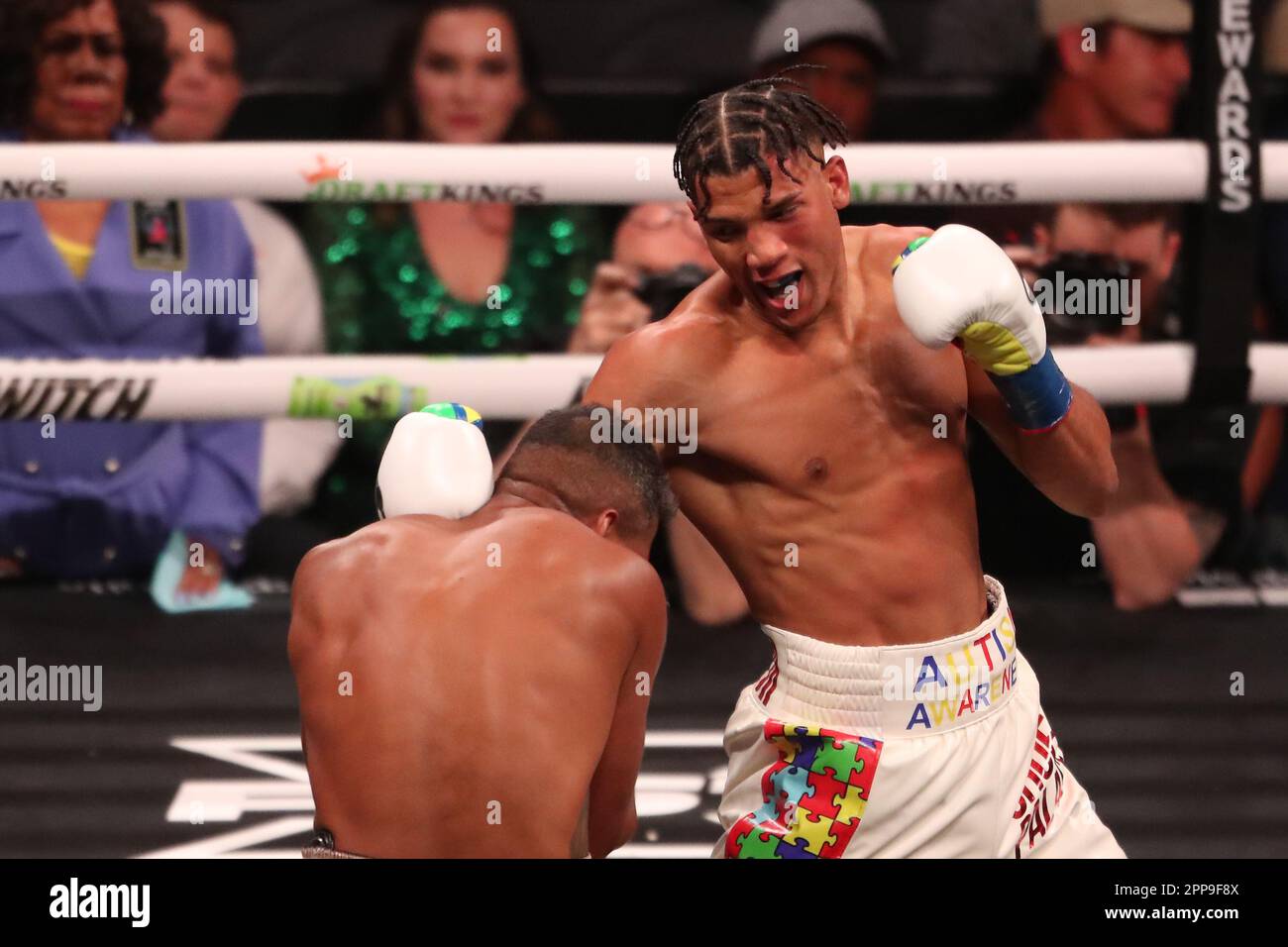 LAS VEGAS, NEVADA -April 22: (R-L) David Morrell Jr. punches Yamaguchi ...