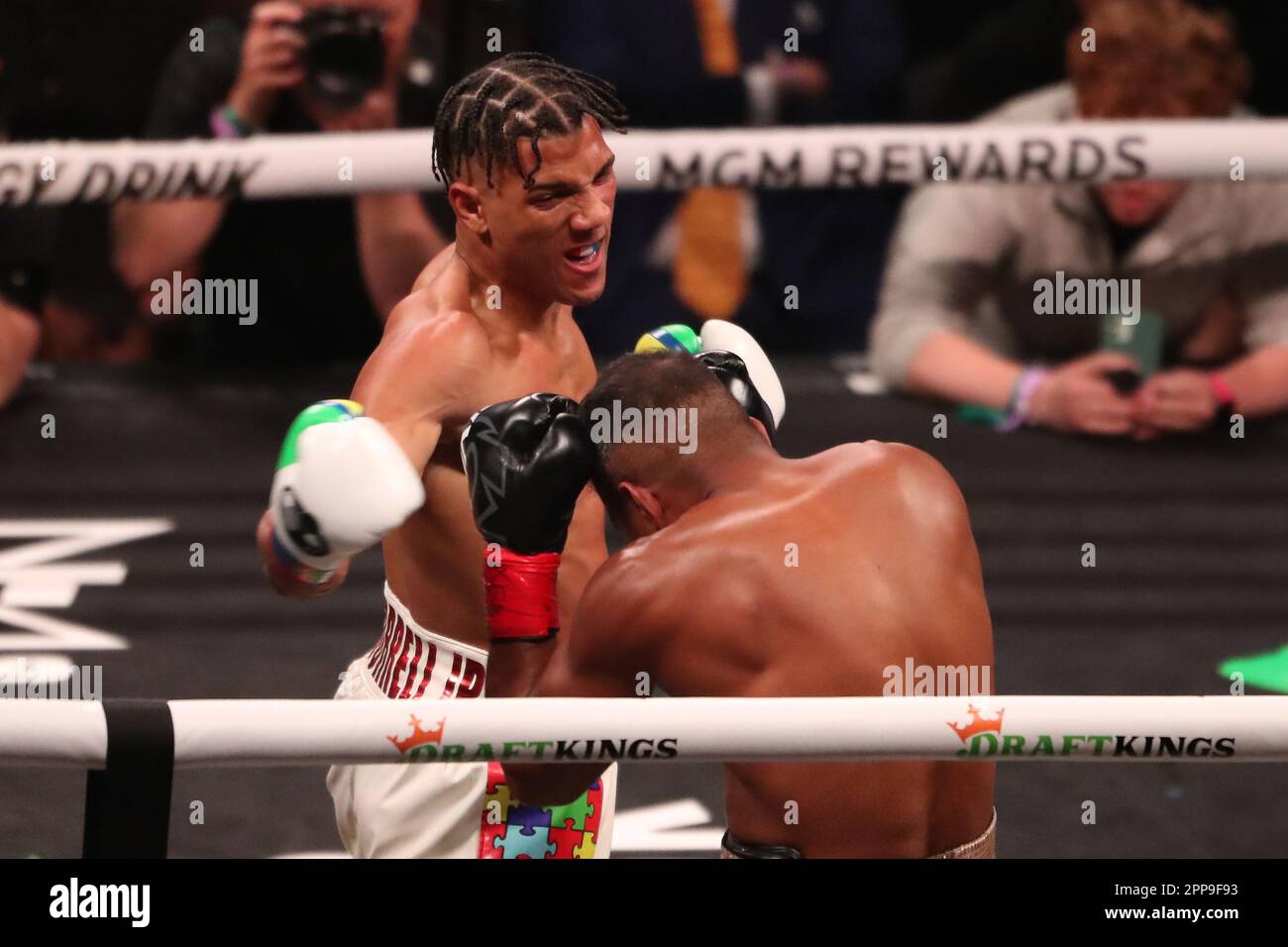 LAS VEGAS, NEVADA -April 22: (L-R) David Morrell Jr. punches Yamaguchi ...