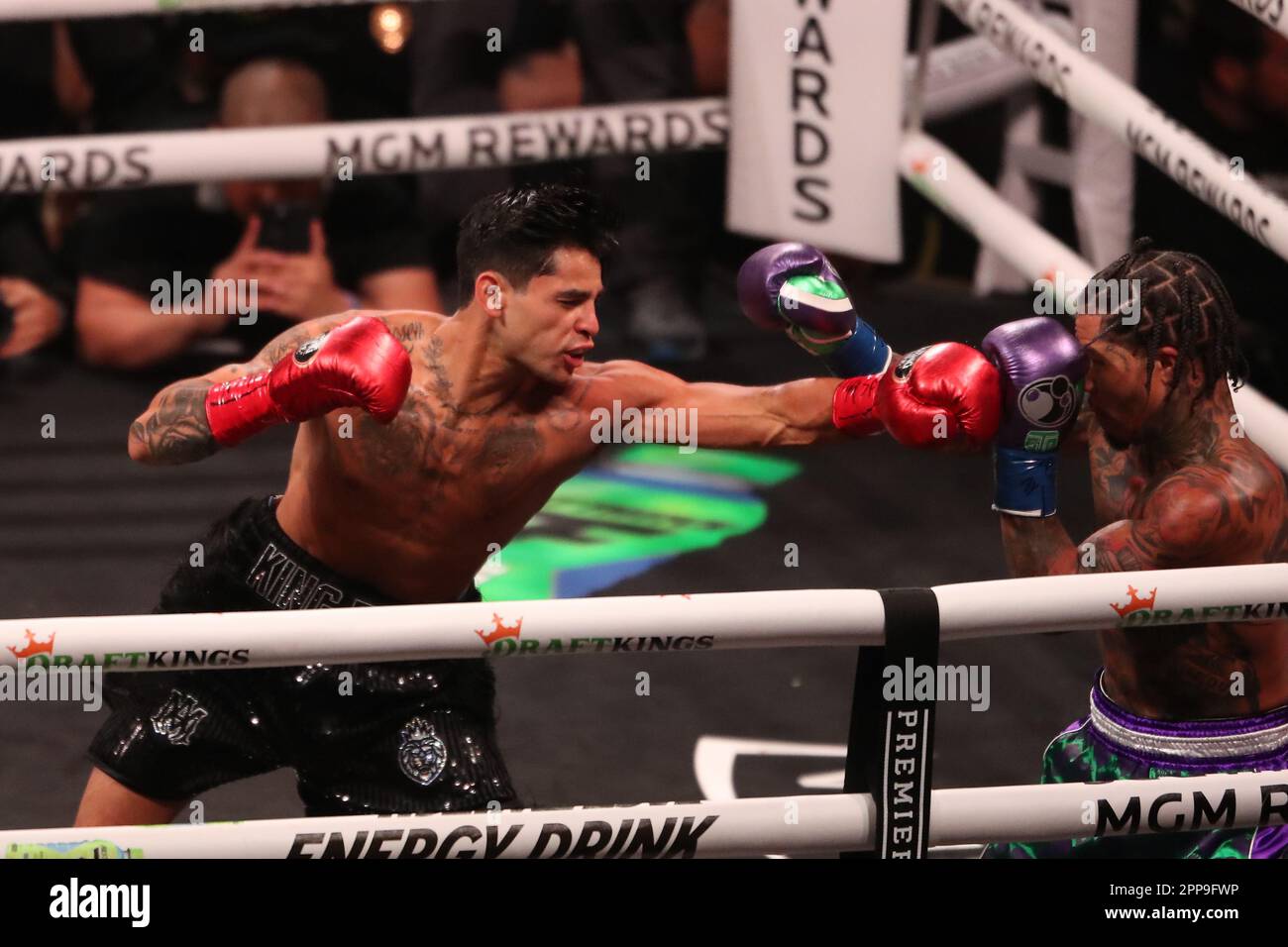 LAS VEGAS, NEVADA -April 22: (L-R) Ryan Garcia punches Gervonta Davis ...