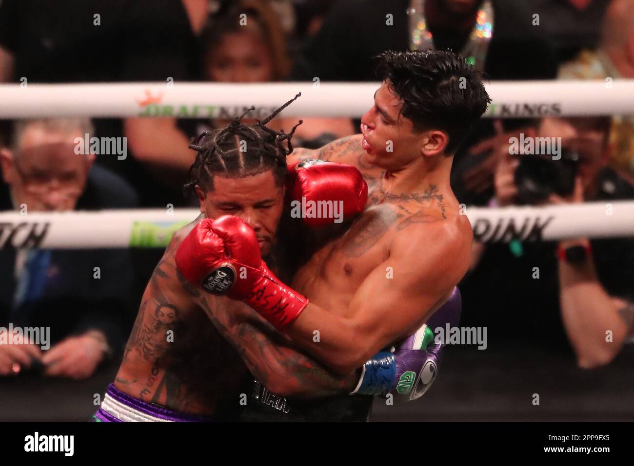 LAS VEGAS, NEVADA -April 22: (R-L) Ryan Garcia punches Gervonta Davis ...