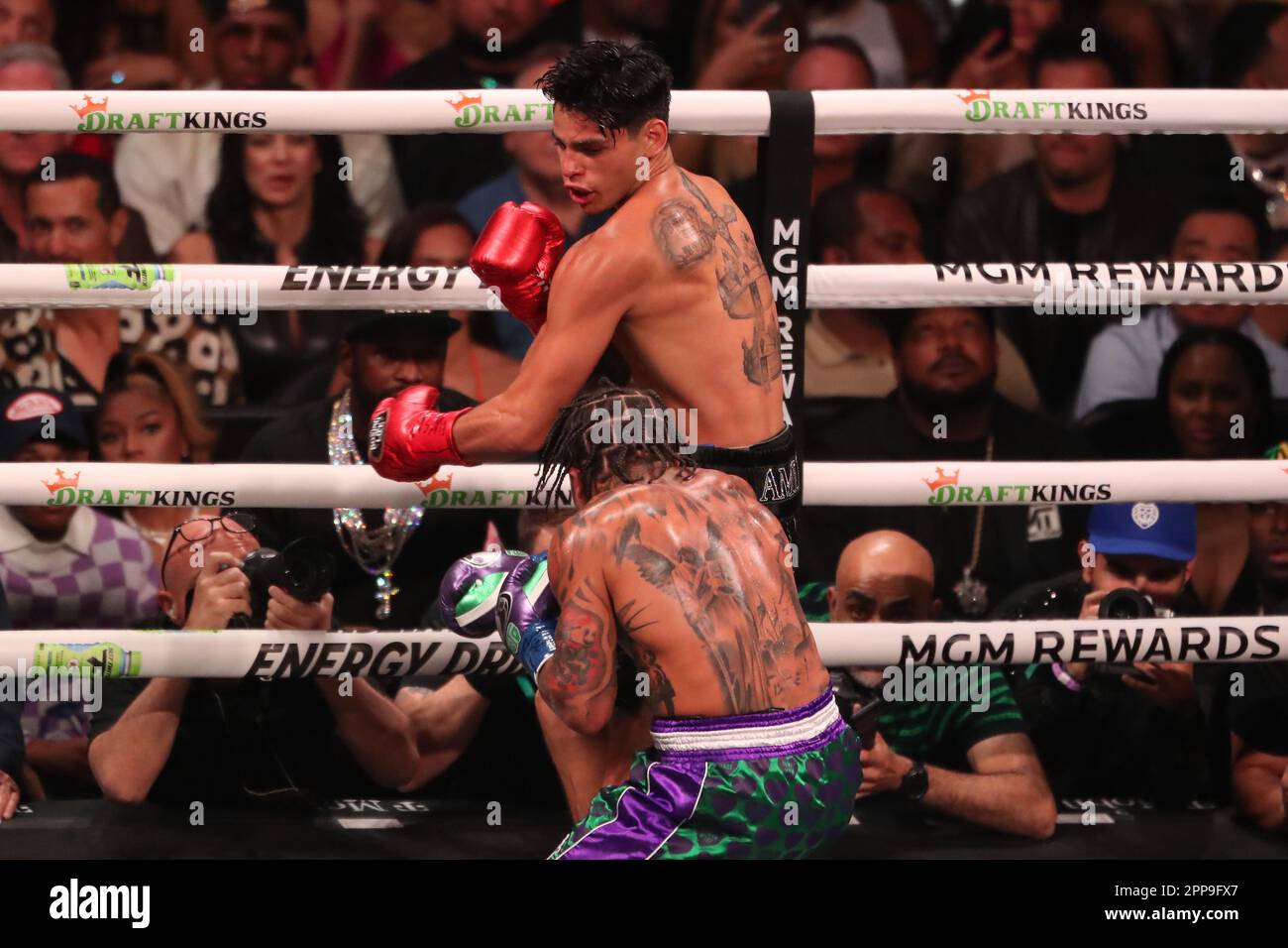 LAS VEGAS, NEVADA -April 22: (R-L) Ryan Garcia punches Gervonta Davis ...