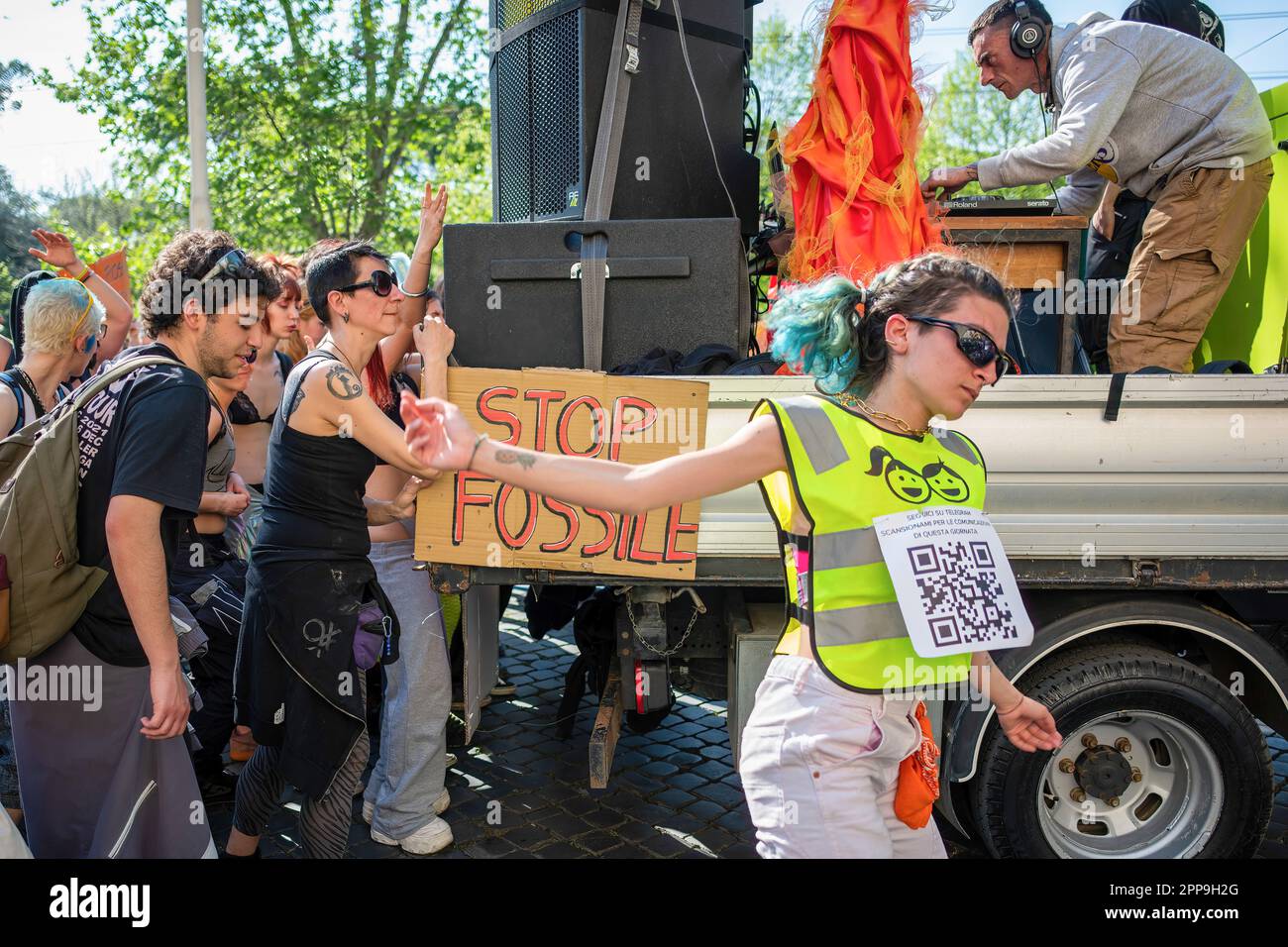 Rome, Italy. 22nd Apr, 2023. Protesters dance next to a placard that ...