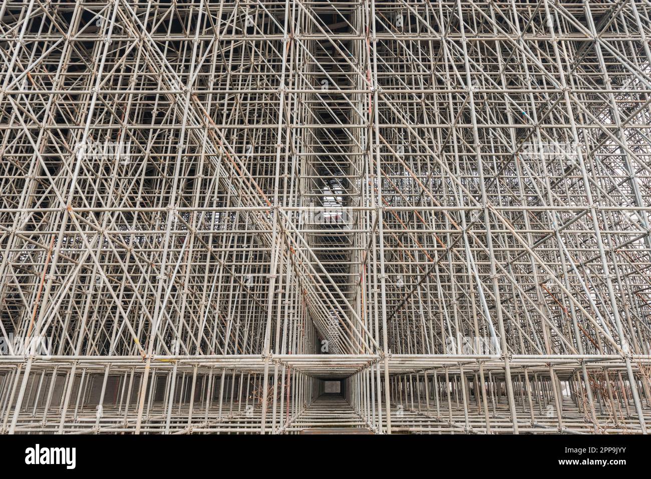 Vertical scaffolding formed a myriad of grid. Industrial and modern ...