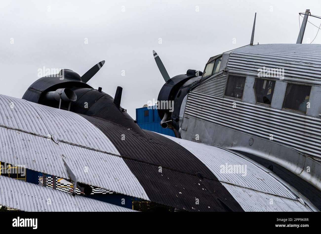 The photo shows a section of a historic propeller plane Junkers Ju 52 ...