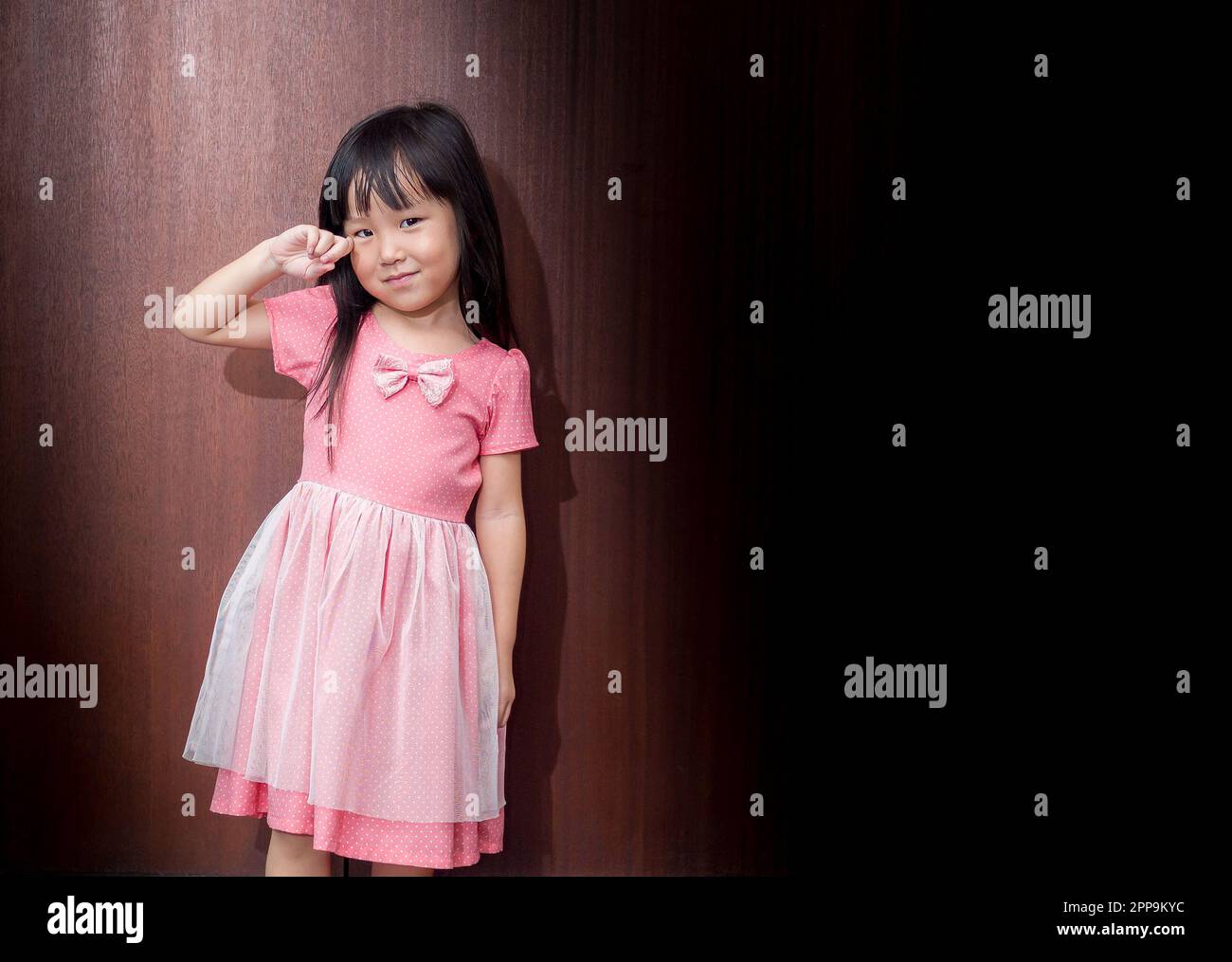 Portrait of a little Asian kid girl , crying action Stock Photo - Alamy