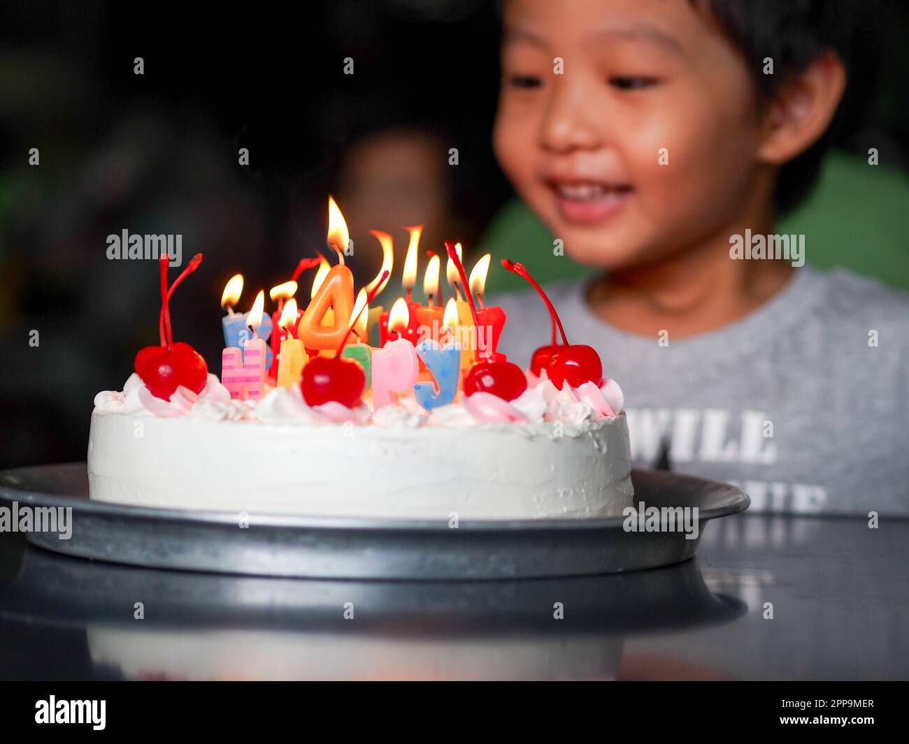 Adorable four year old kid boy celebrating his birthday Stock Photo - Alamy Adorable four year old kid boy celebrating his birthday Stock Photo - Alamy