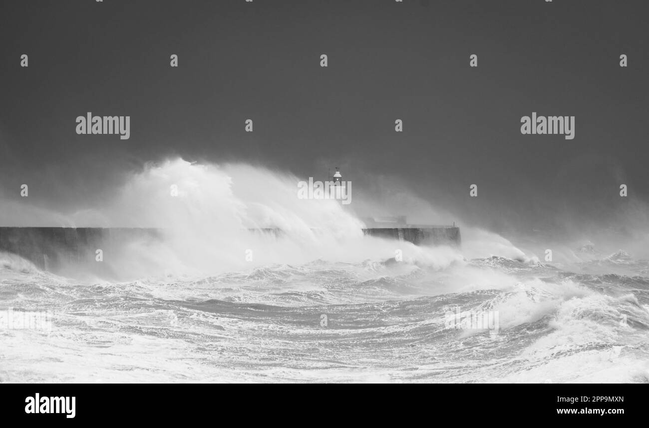 Storm Noa and crashing waves at Newhaven lighthouse and seawall on the ...