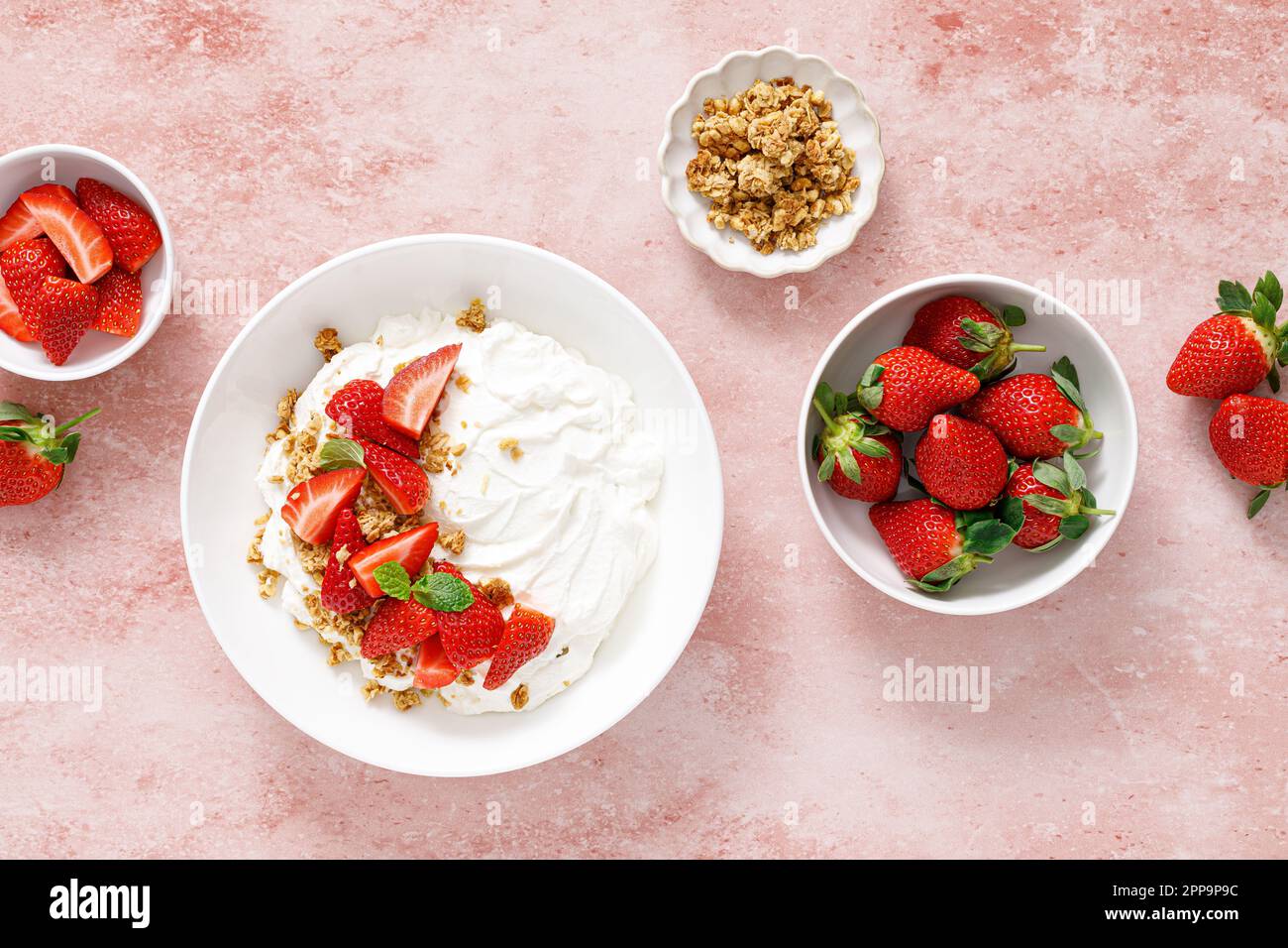 Yogurt with strawberry. Plain white greek yogurt with fresh berries and ...