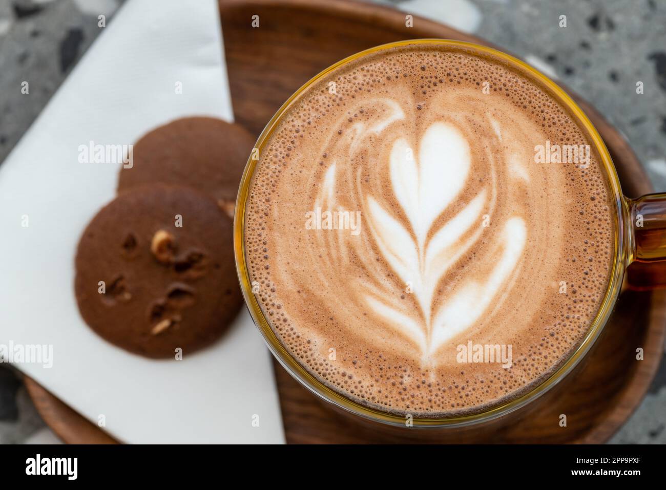 Cup of cappuccino with latte art top view Stock Photo - Alamy