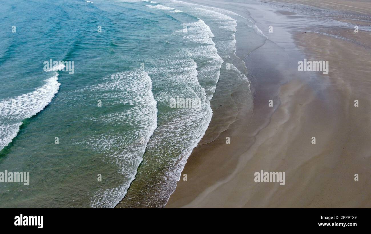 Wet coastal sand and sea waves, top view. Sandy beach and ocean tide ...