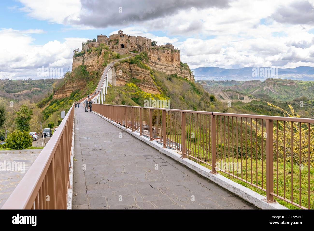 The long steep bridge leading to the dying city, Civita di Bagnoregio ...