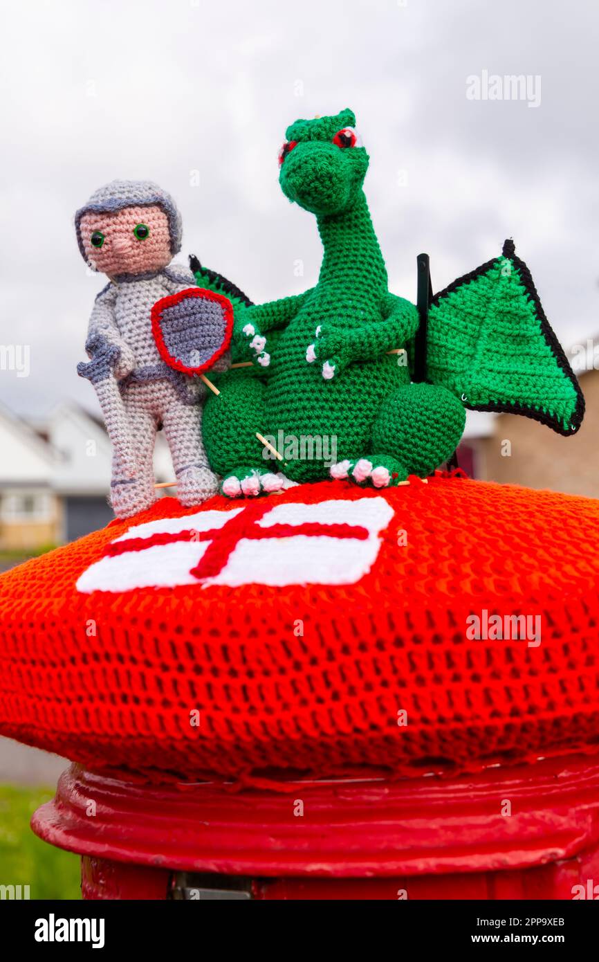 Poole, Dorset, UK. 23rd April 2023. A knitted crocheted postbox topper ...