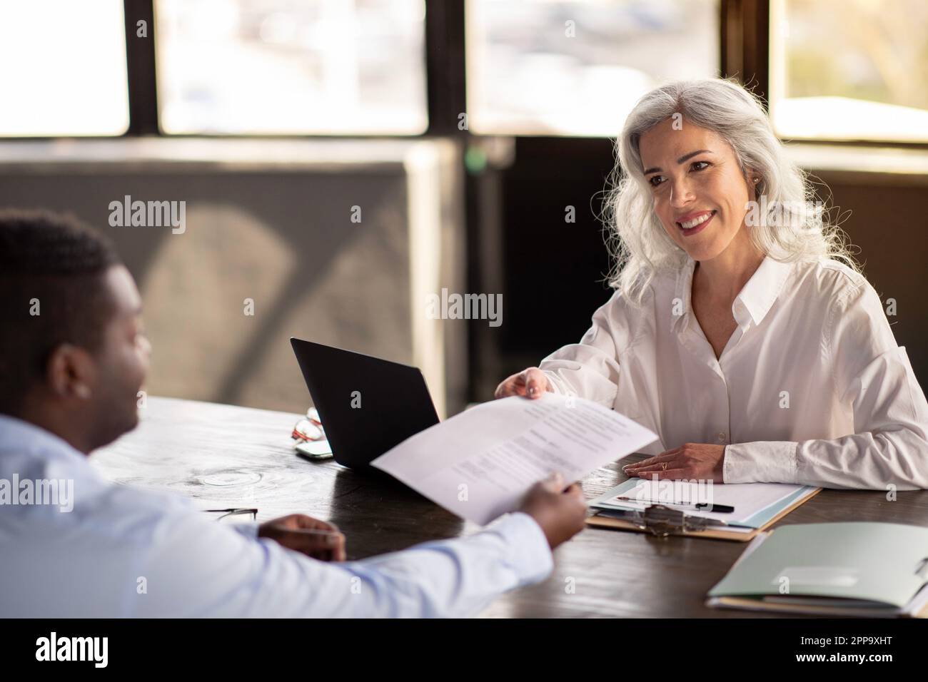 Middle aged job applicant interview hi-res stock photography and images ...