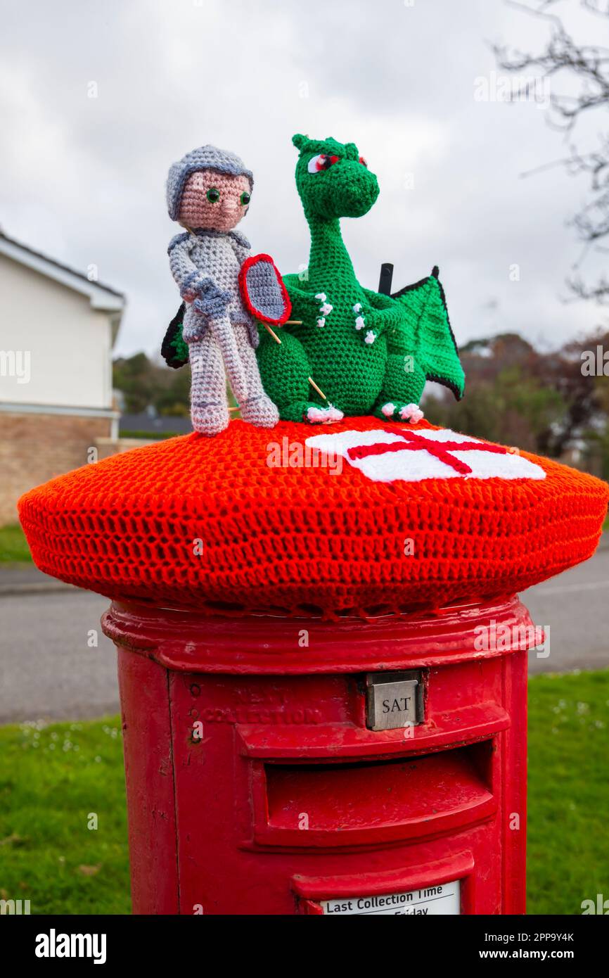 Poole, Dorset, UK. 23rd April 2023. A knitted crocheted postbox topper ...