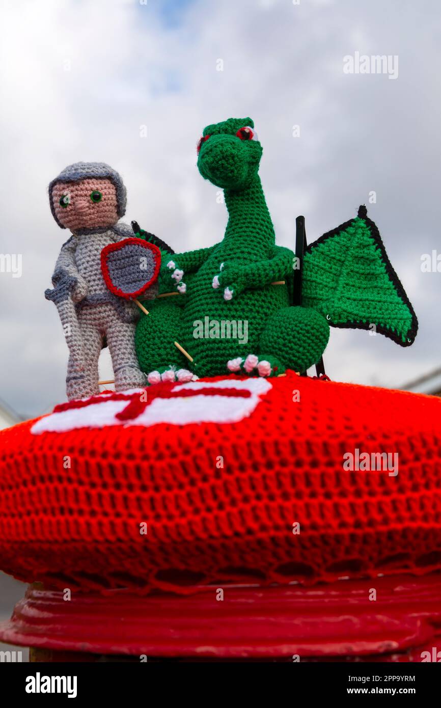 Poole, Dorset, UK. 23rd April 2023. A knitted crocheted postbox topper ...