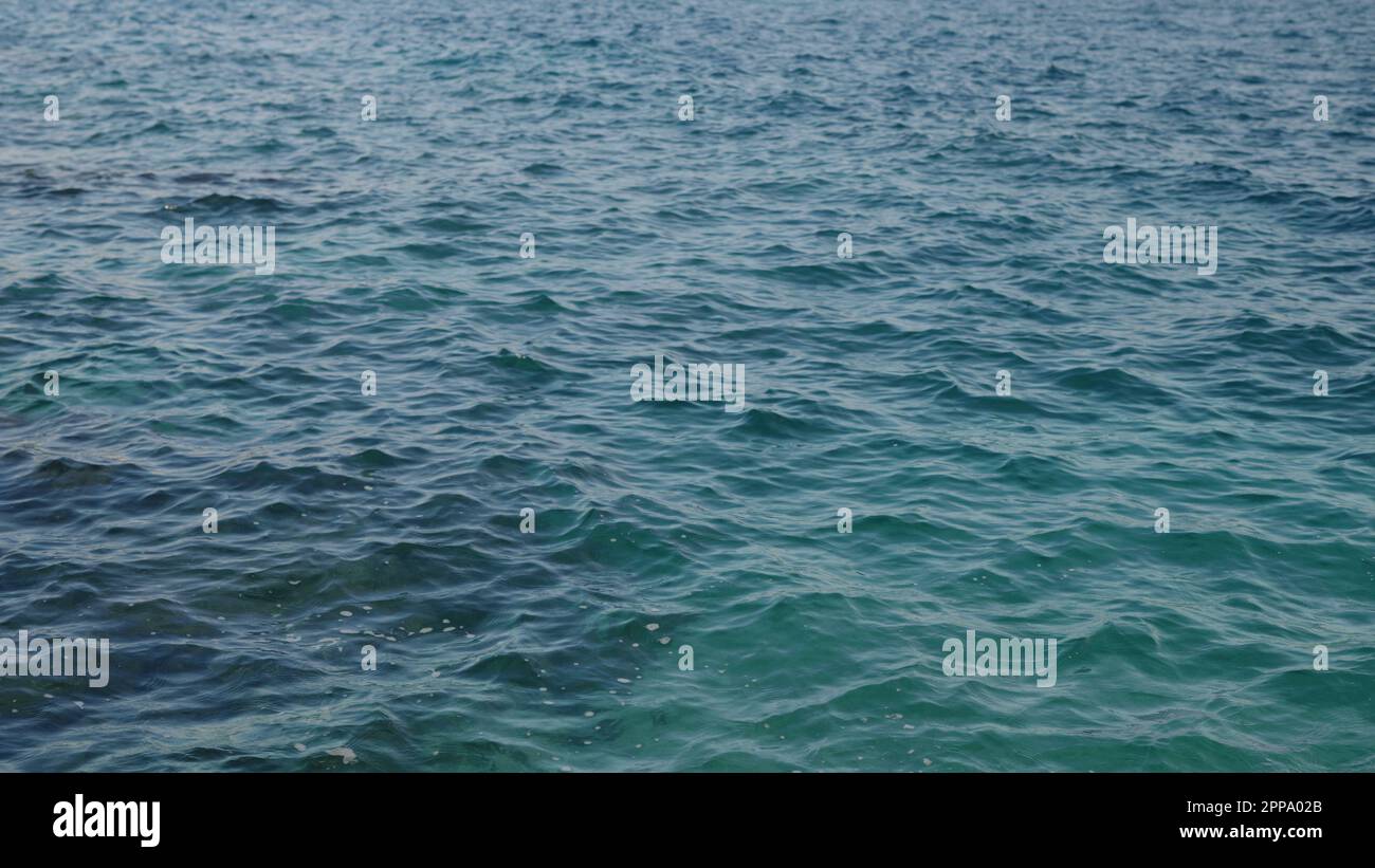 Closeup mediterranean sea background with beautiful azure color, wide ...