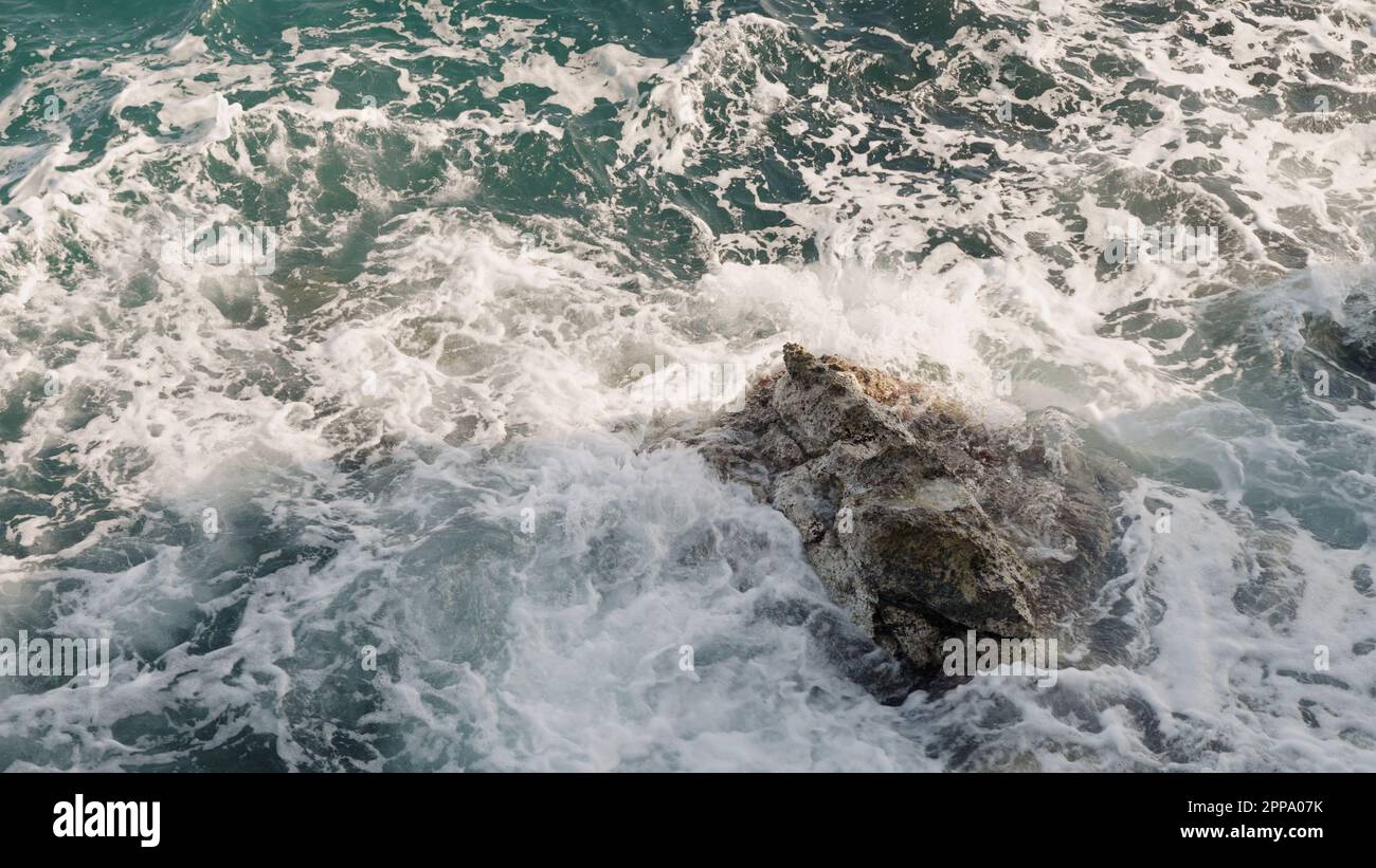 Azure waves of mediterranean sea splashing on French Riviera coast ...