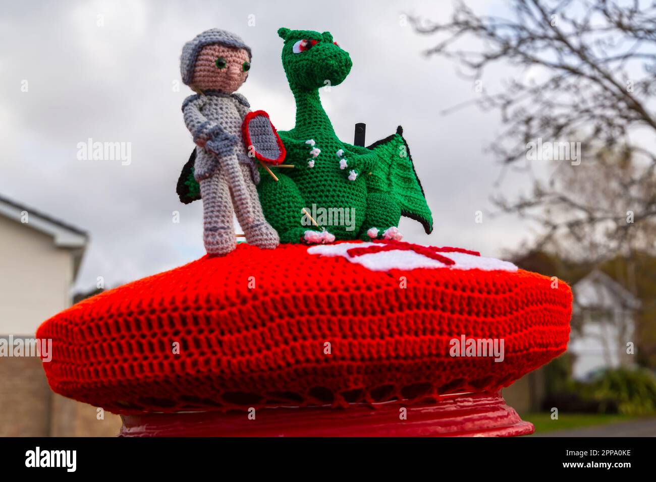 Poole, Dorset, UK. 23rd April 2023. A knitted crocheted postbox topper ...