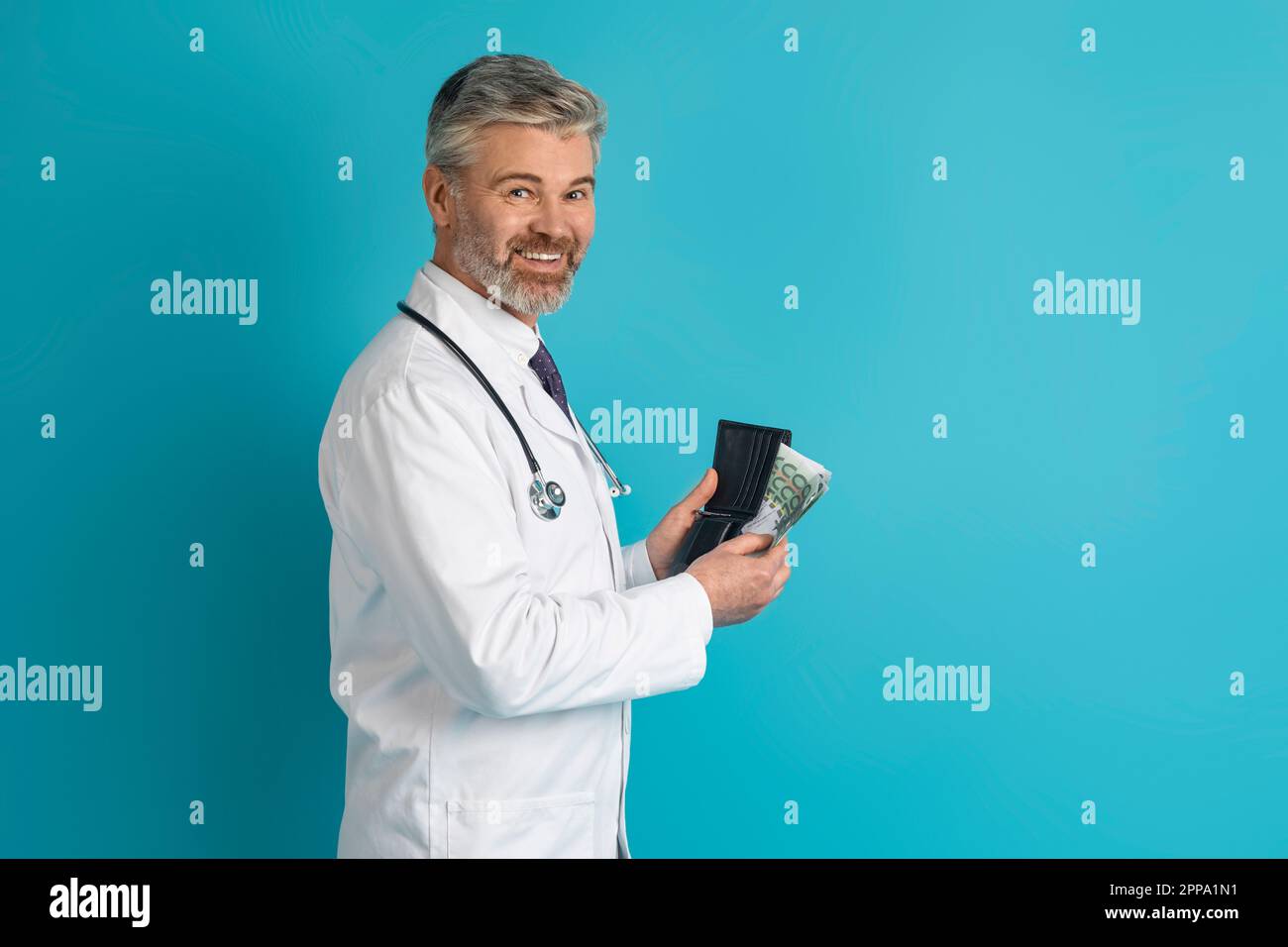 Doctor counting money in medical hi-res stock photography and images ...