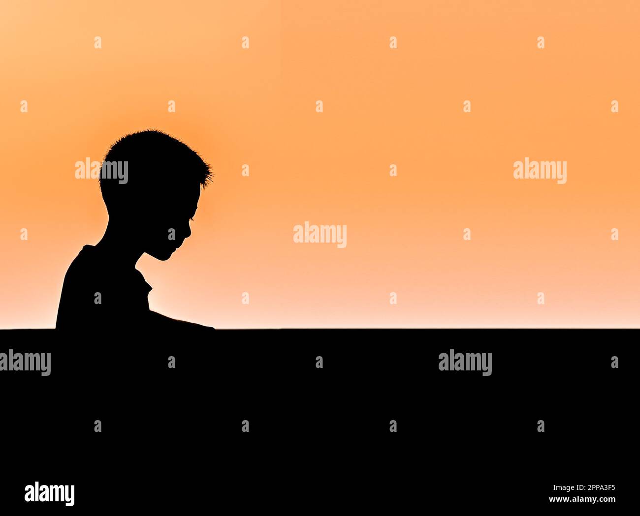 isolated of a boy looking for something , sun light background Stock ...