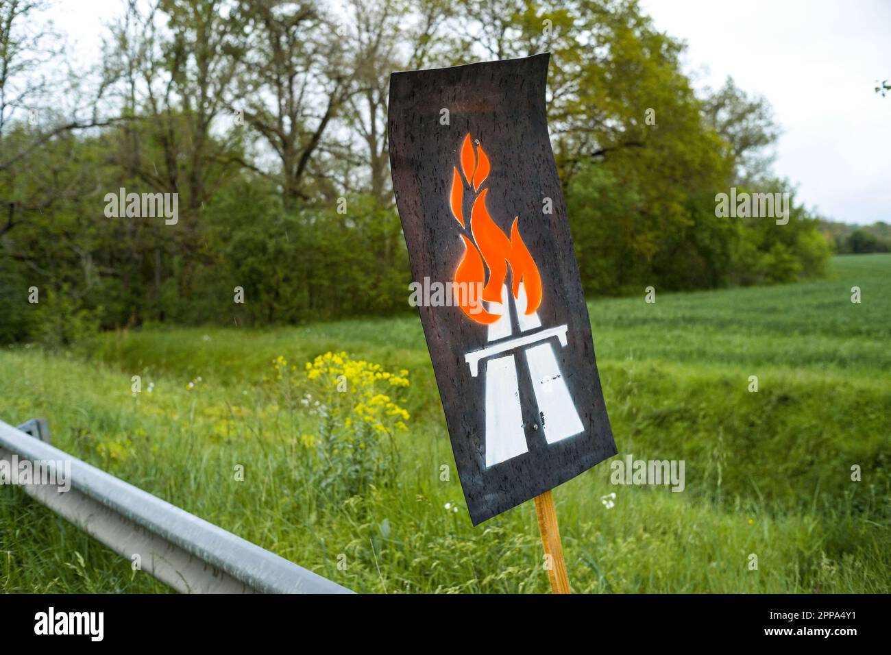 Earth on fire placard hi-res stock photography and images - Alamy