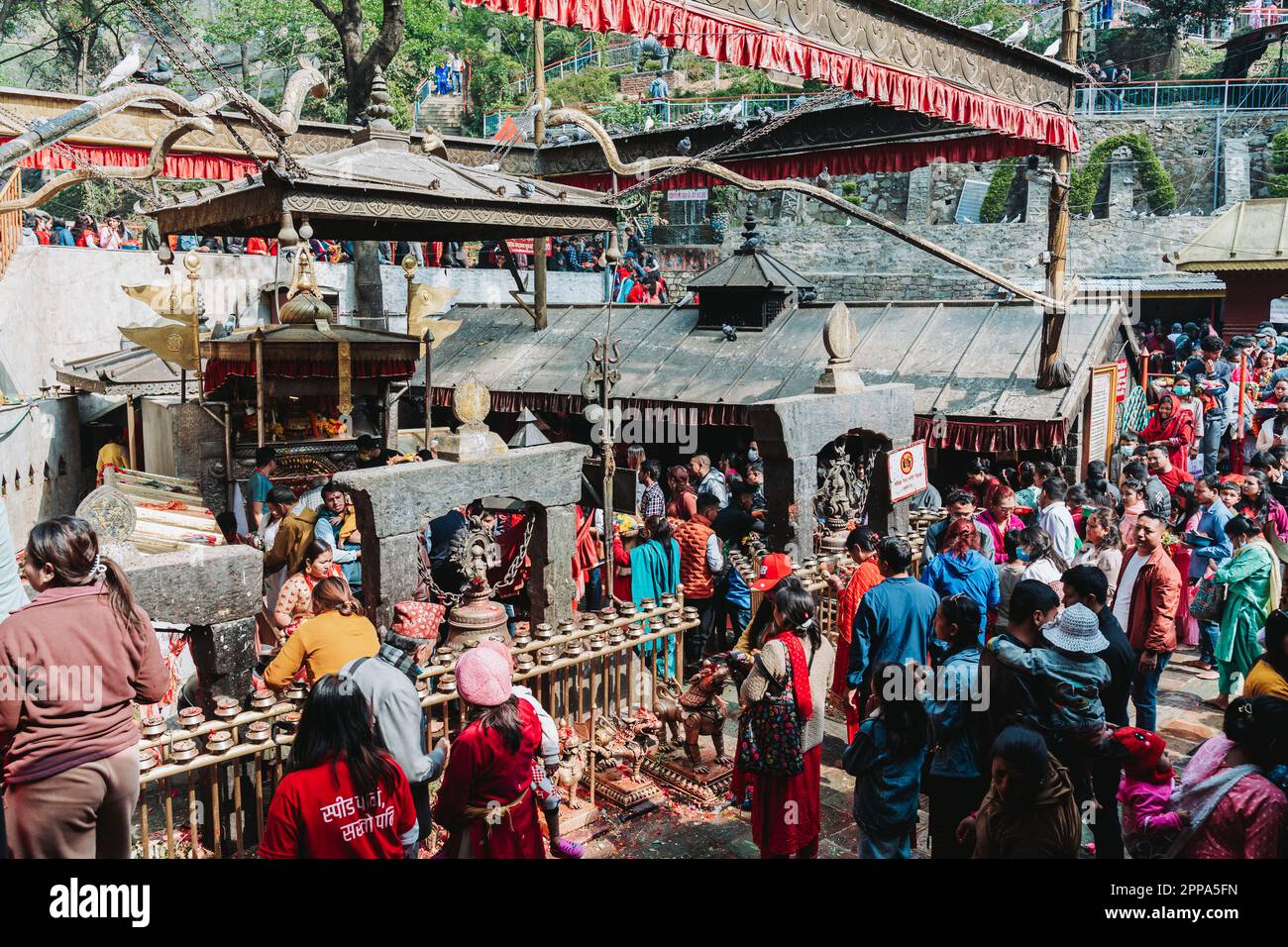 kATHMANDU, NEPAL - April 14, 2023: Hindu devotees offering prayers at ...