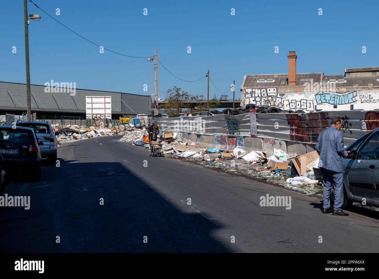 Marseille, France. 19th Apr, 2023. Poor people search the rubble of the ...