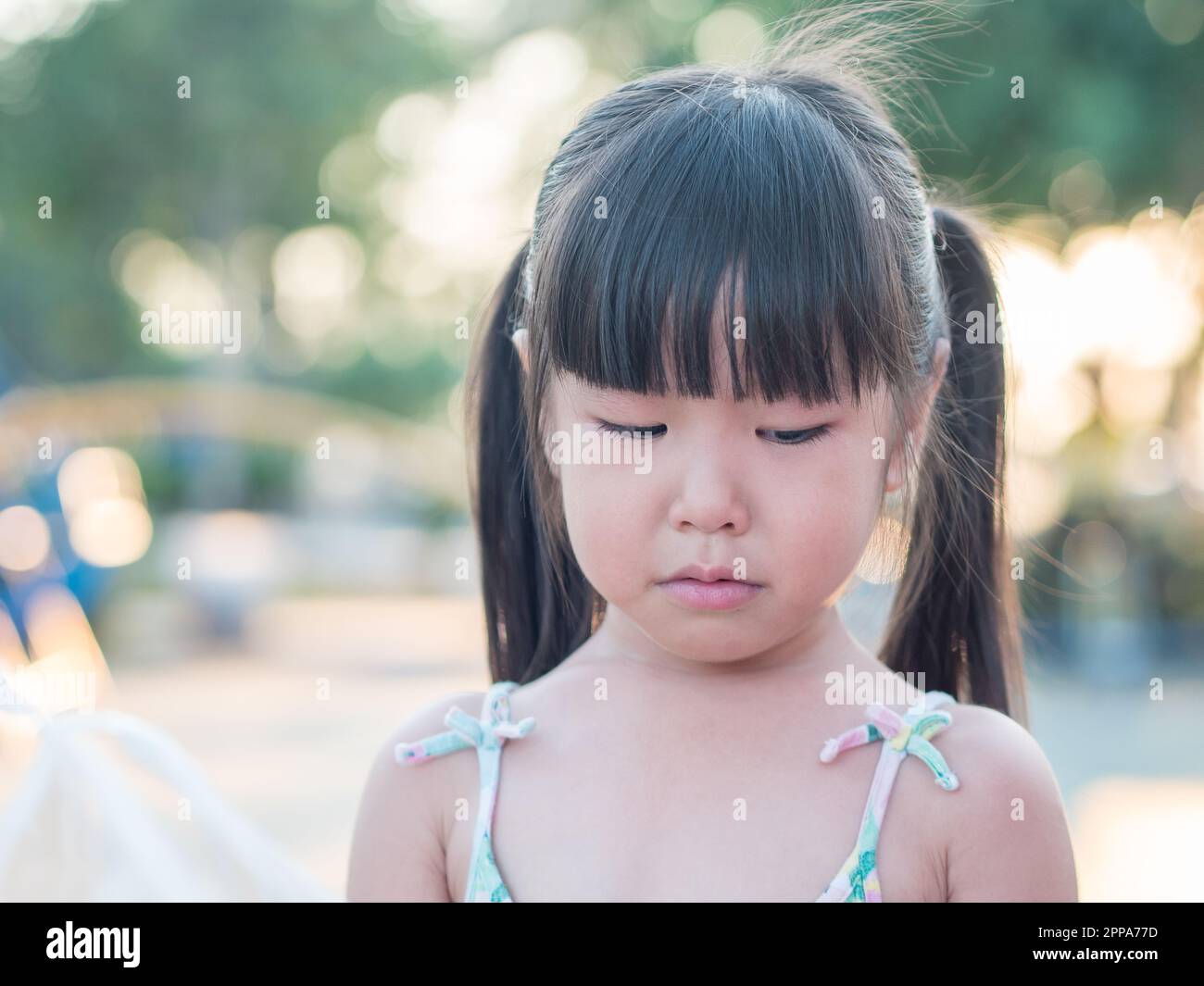 Portrait of a cute little girl , crying action, sunset light Stock ...