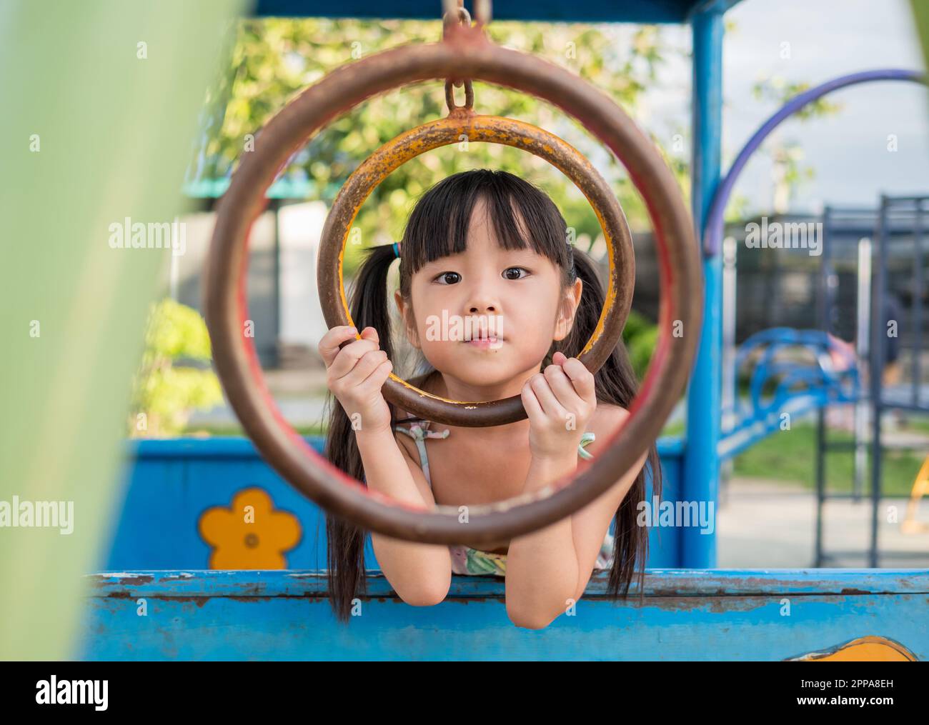 asian baby child playing on playground Stock Photo - Alamy