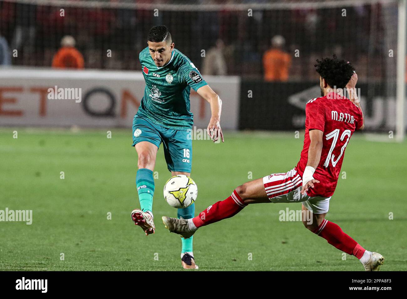 Cairo. 22nd Apr, 2023. Marwan Attia (R) of Al Ahly competes with ...
