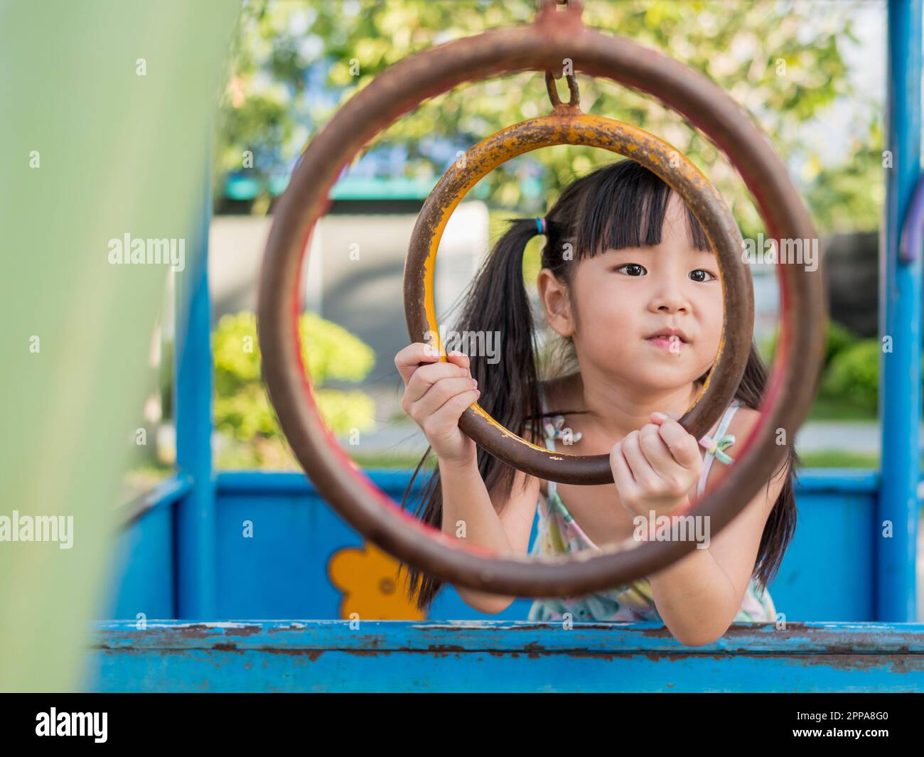 asian baby child playing on playground Stock Photo - Alamy
