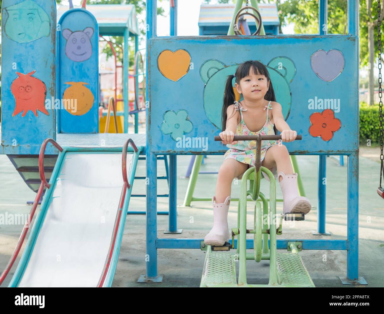 asian baby child playing on playground Stock Photo - Alamy