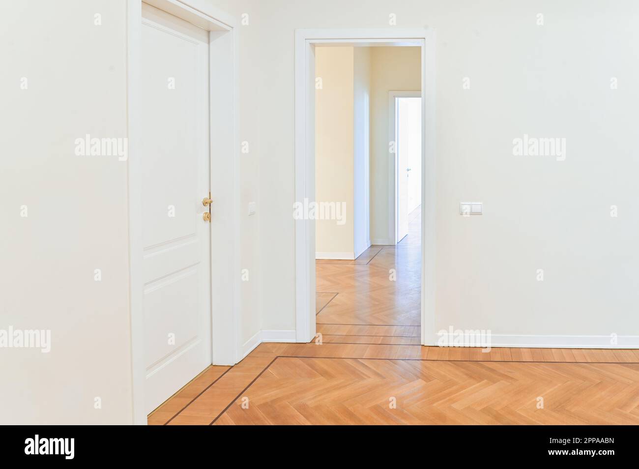 Wooden floor an apartment with white walls, empty rental property Stock ...