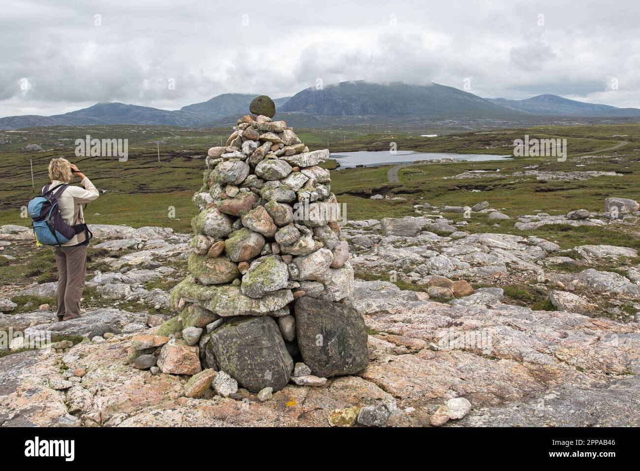 Female Walker on Summit of Àird Mhòr Mhangarstaidh, Uig, Lewis, Isle of ...