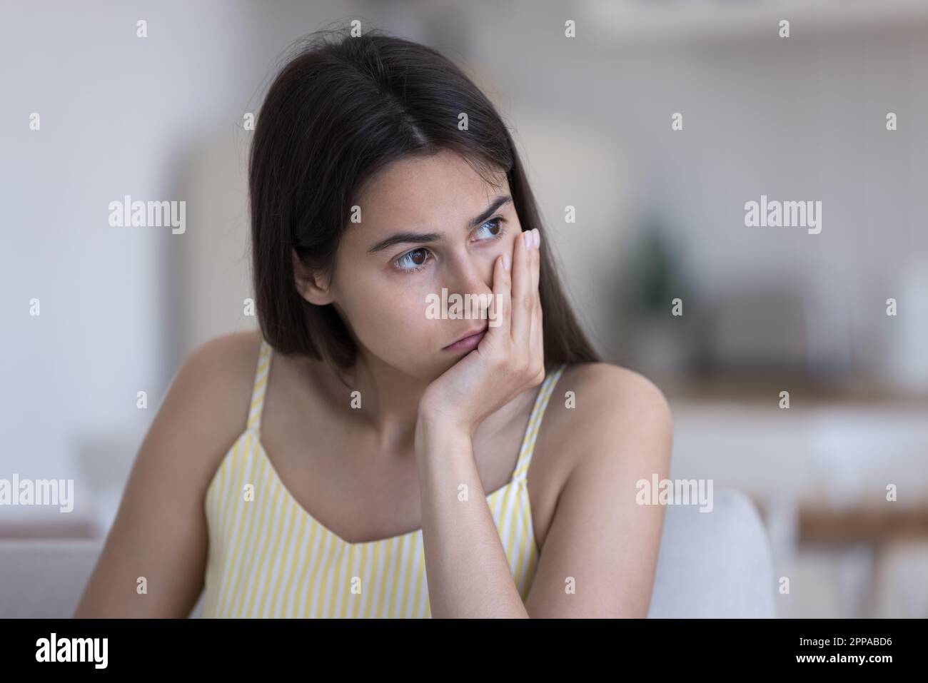 Thoughtful concerned young woman thinking over problems Stock Photo - Alamy