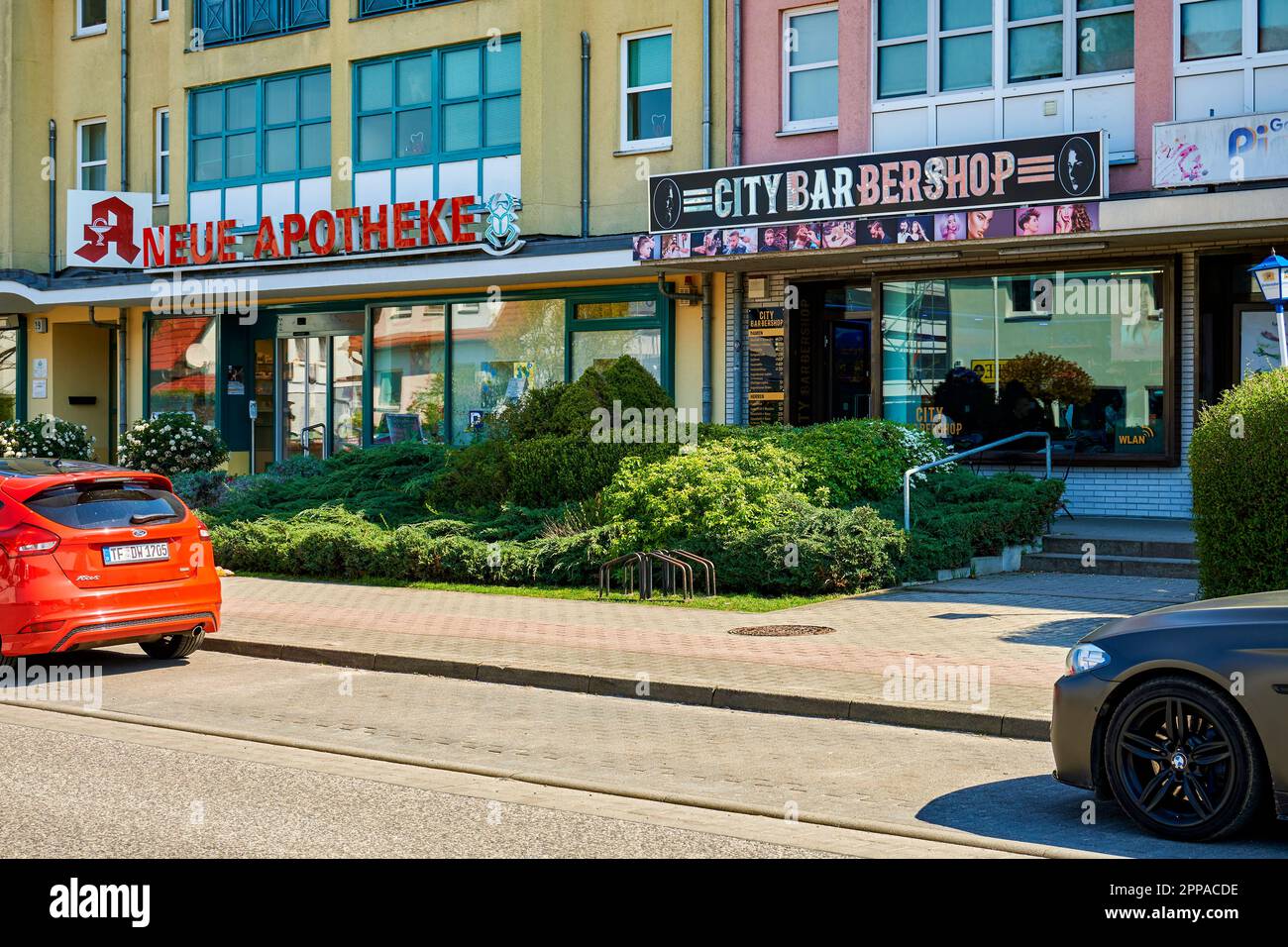 Mahlow, Germany - April 21, 2023: Street view with shops in a small ...